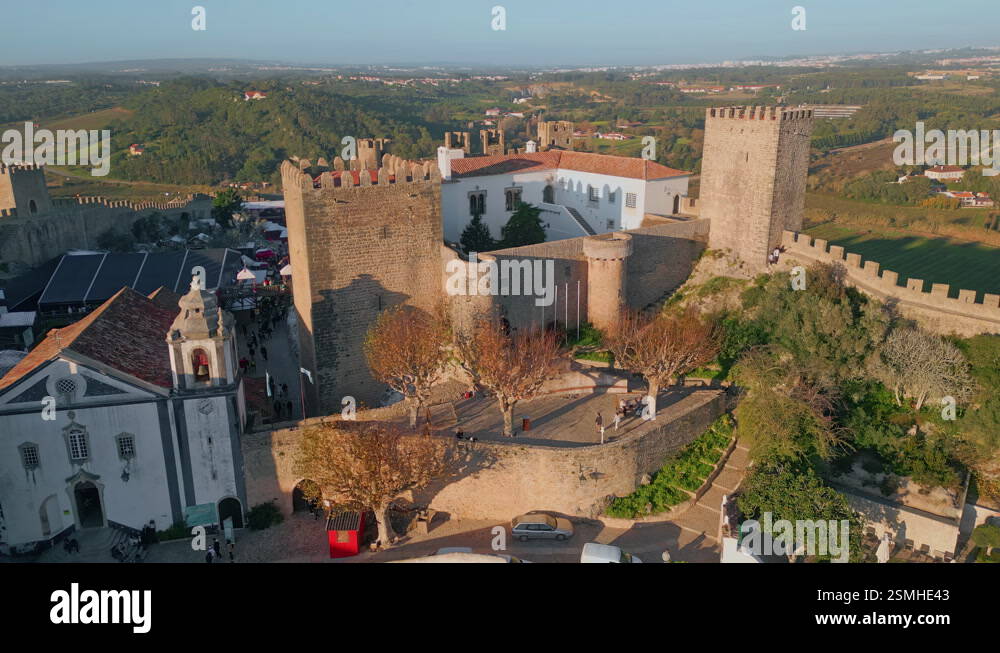 Drone grand medieval castle with towers standing proudly. Historic ...