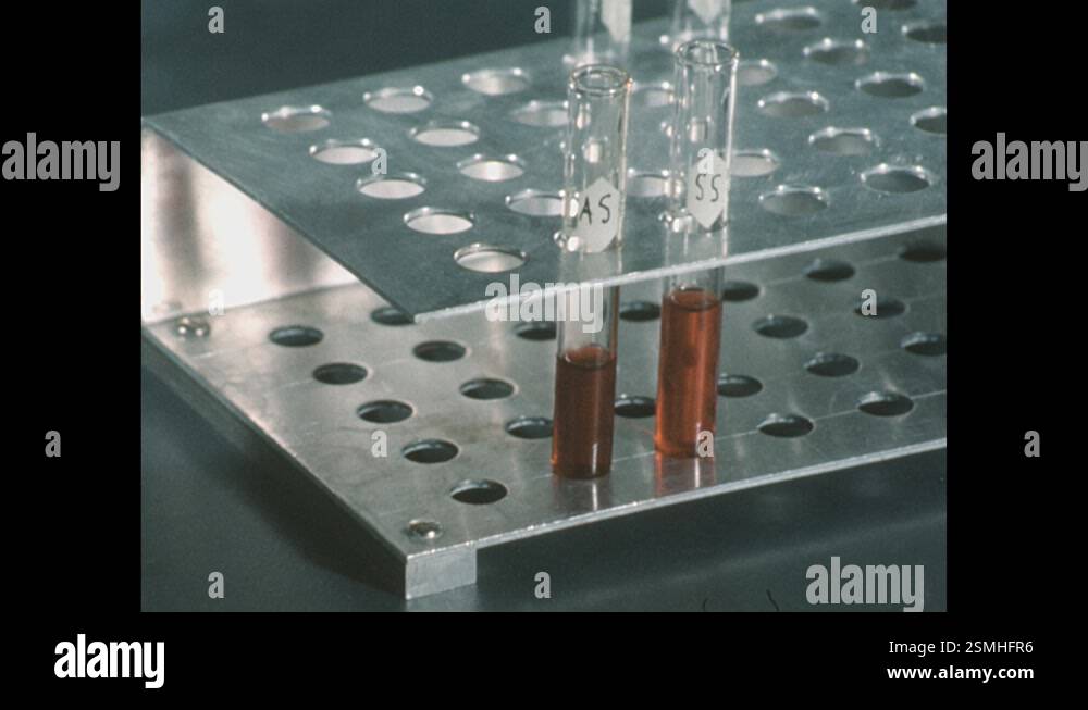 1960s: Liquids in three labeled test tubes. Person picks one up and ...