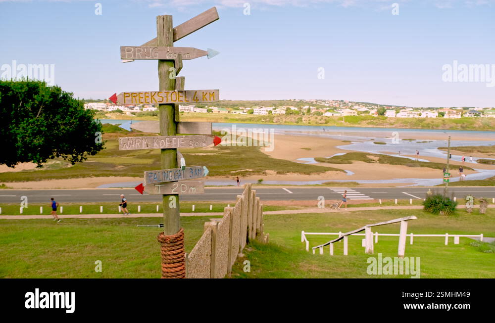Signpost with directions in Stilbaai East area overlooking Goukou ...