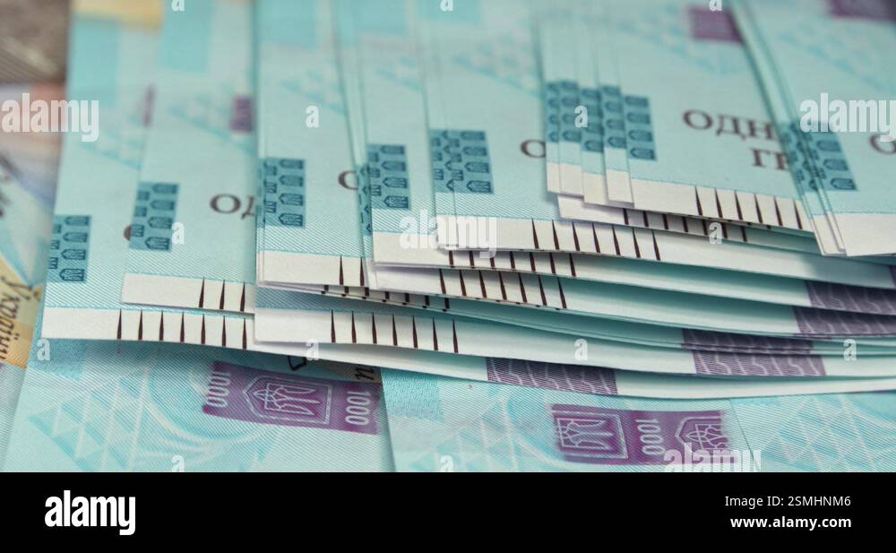 Banknotes 1000 Hryvnia. Real Ukrainian paper money of blue yellow color ...