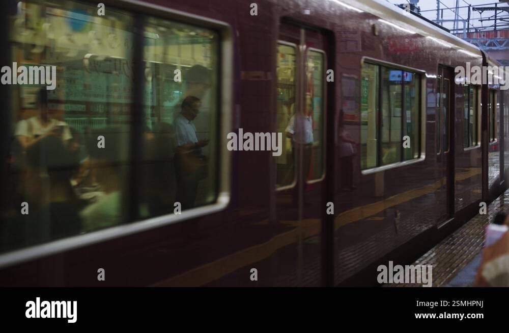 Osaka, Japan - 07/10/2024: Japanese commuter train arriving during ...