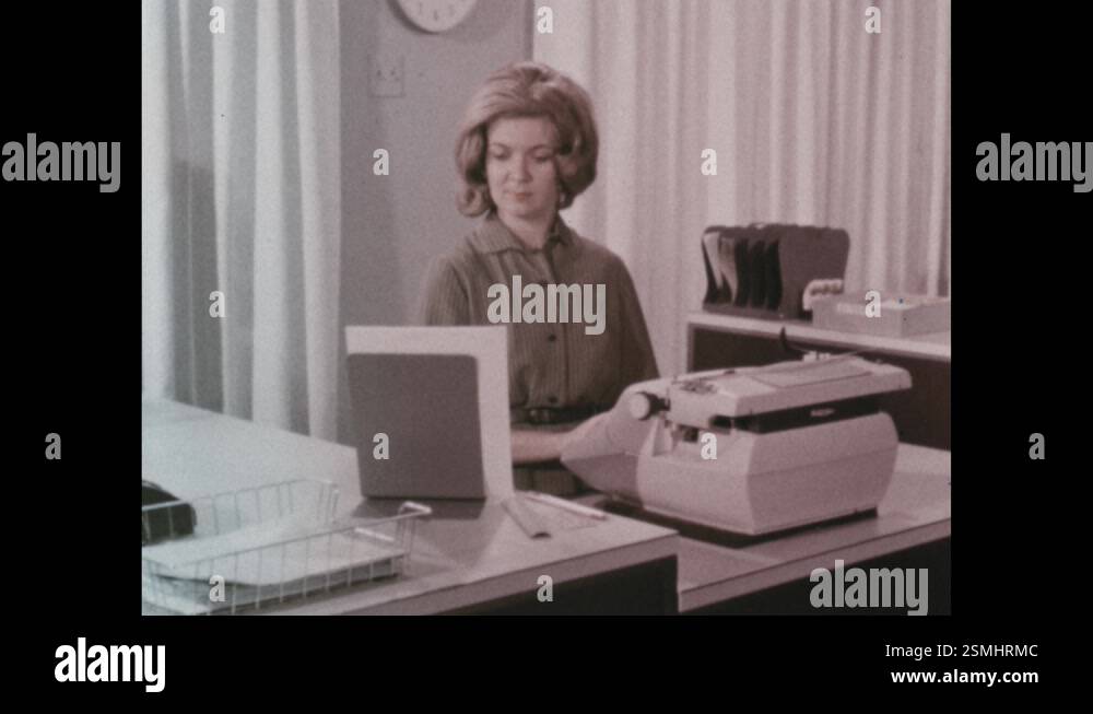 1960s: Secretary types at desk. Text appears above woman. Hands shuffle ...