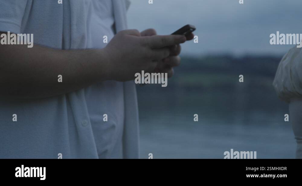 Man and woman exchange cell phone numbers Stock Video Footage - Alamy