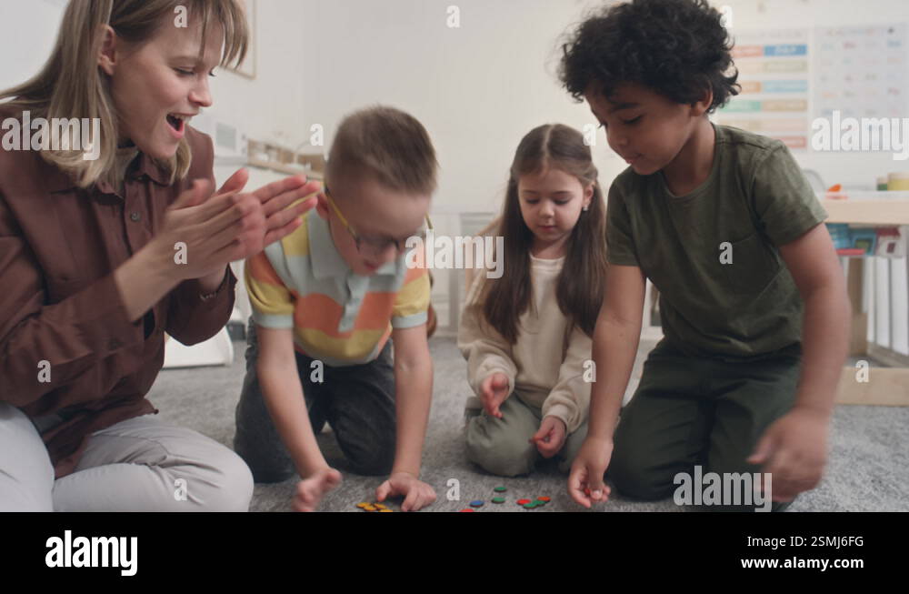 Kids Giving High-Five to Teacher and Clapping Hands after Completing ...
