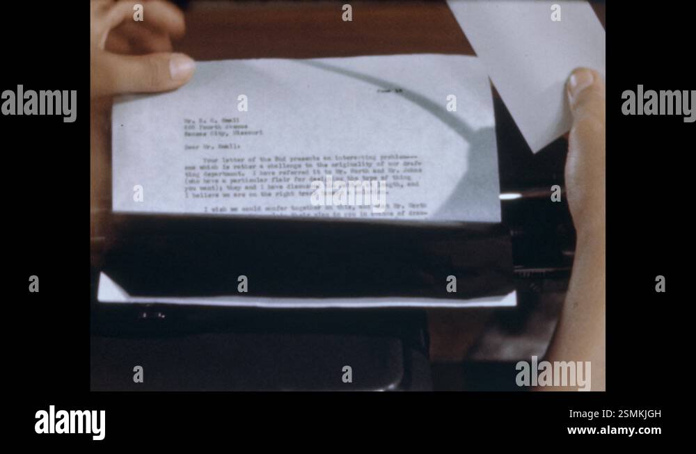1950s: Hands placing papers in typewriter. Woman typing at desk. Pencil ...