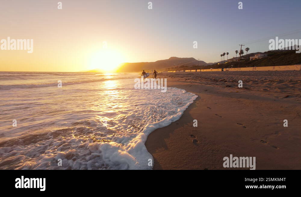 Experience a stunning Malibu beach sunset walk filmed in 4K resolution ...