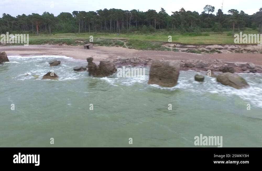 Ruins of an old abandoned military fort, bunkers on the Baltic Sea ...