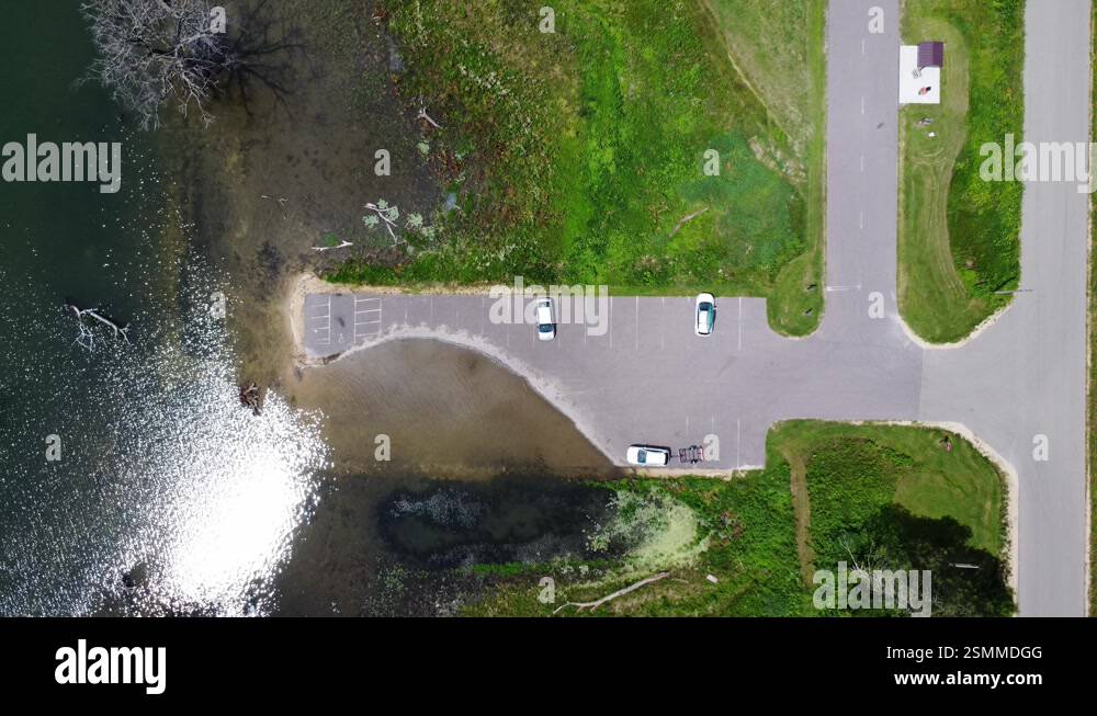 Flood Waters Submerging An Outdoor Parking Lot. Chronic Flooding Issues ...