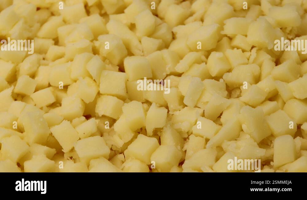 Mozzarella cheese cubes, rotation in a circle. Fresh tasty cheese ...