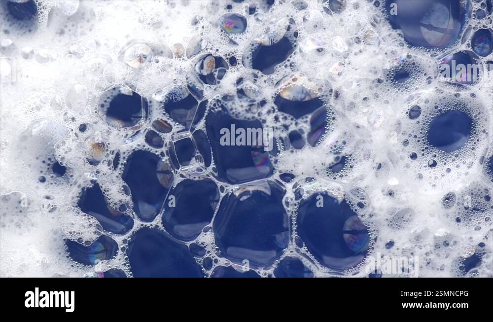 Foam background. Liquid soap bubbles, Froth bubbles rotating backdrop ...