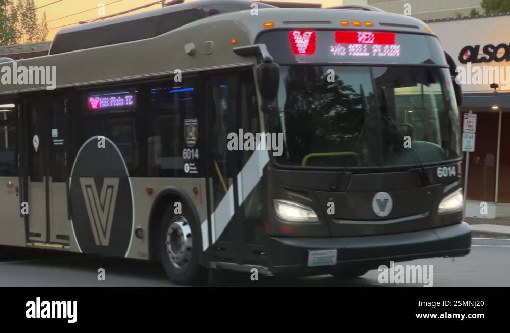 Portland, United States - 08/06/2024: A city bus turns a corner Stock ...