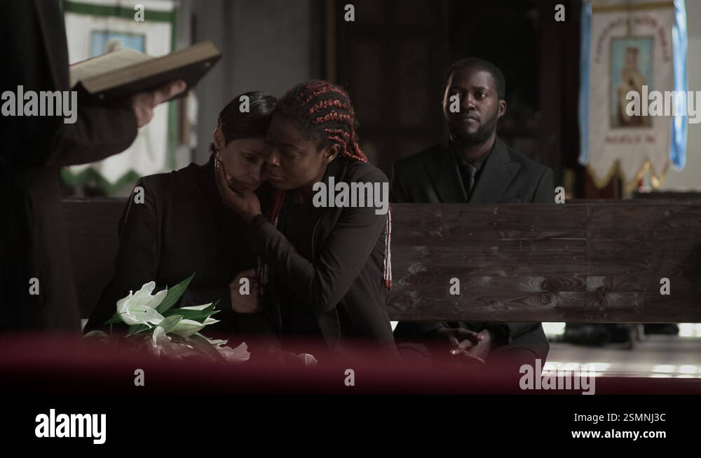 Woman Consoling Friend Touching Her Face and Wiping Tears at Ceremony ...