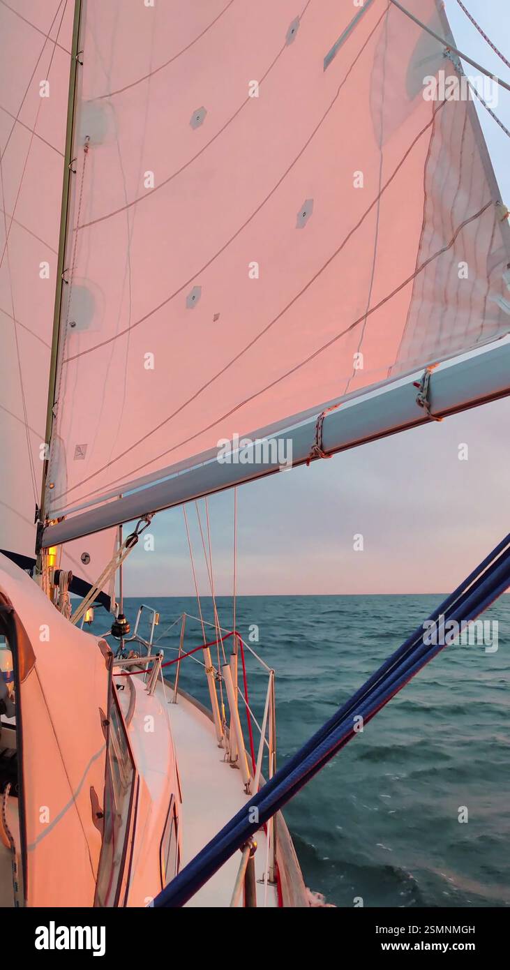 Luxury cruise on a sailing rigged yacht under a genoa and mainsail ...