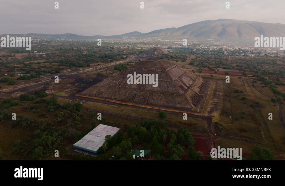 Drone aerial orbit overlooks the iconic Pyramid of the Sun and the ...