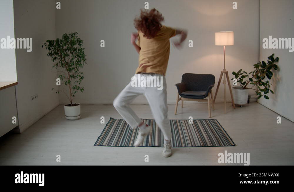Gen Z Guy Feeling Super Excited and Dancing at Home Stock Video Footage ...