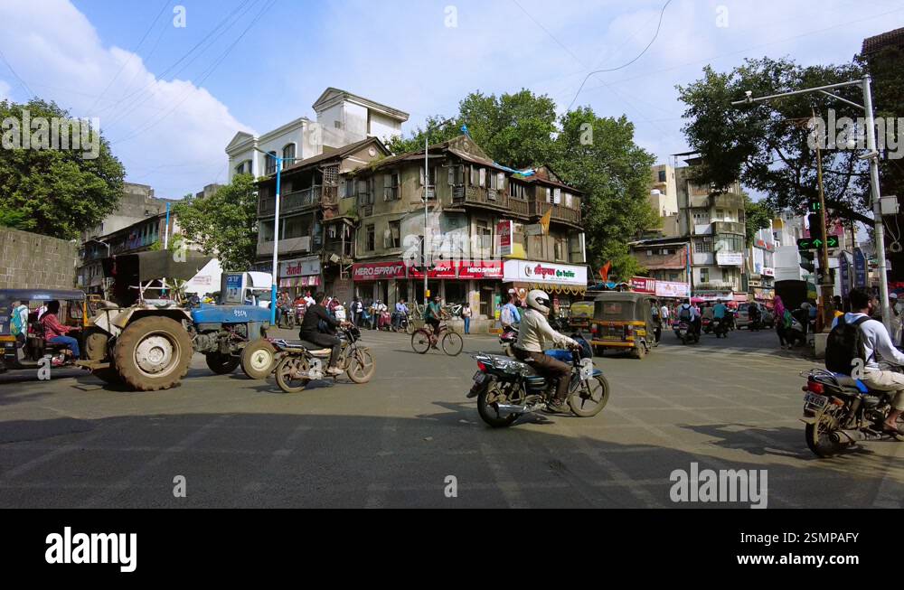 PUNE, INDIA - August 14, 2024: Traffic of Motorcycles and Cars in Pune ...