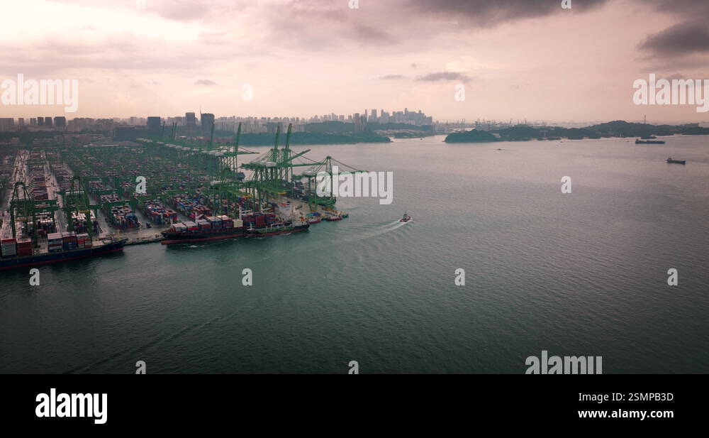 Singapore Commercial Port and logistic area with city in background ...