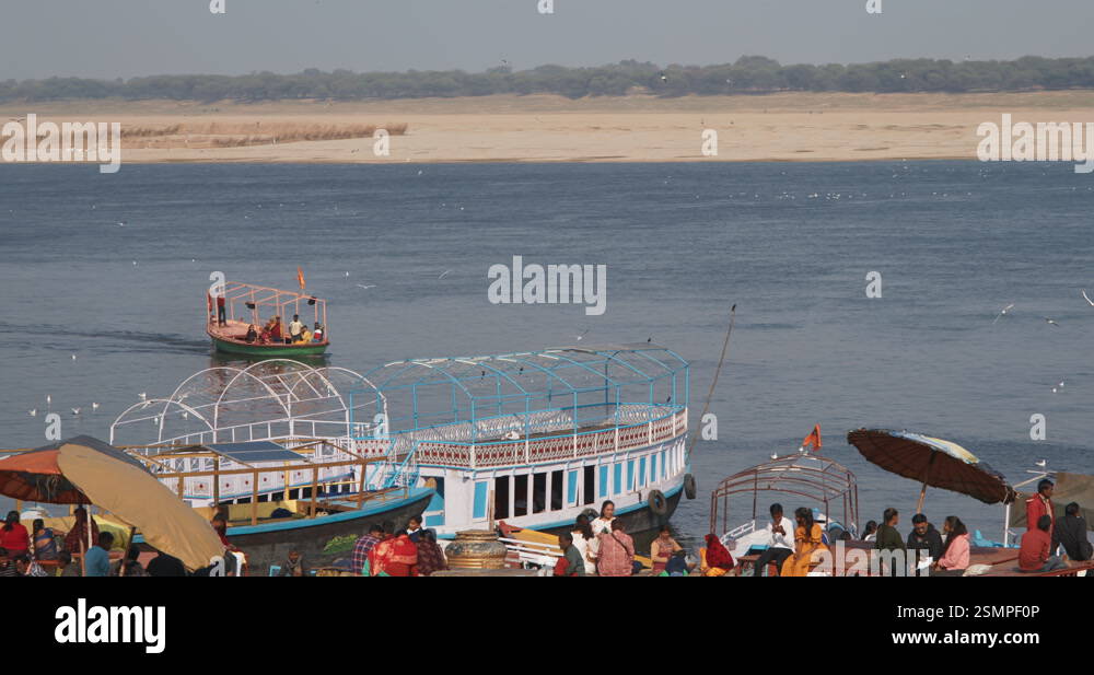Varanasi, India. Tourists And Indian Pilgrims Floating On Ganga ...