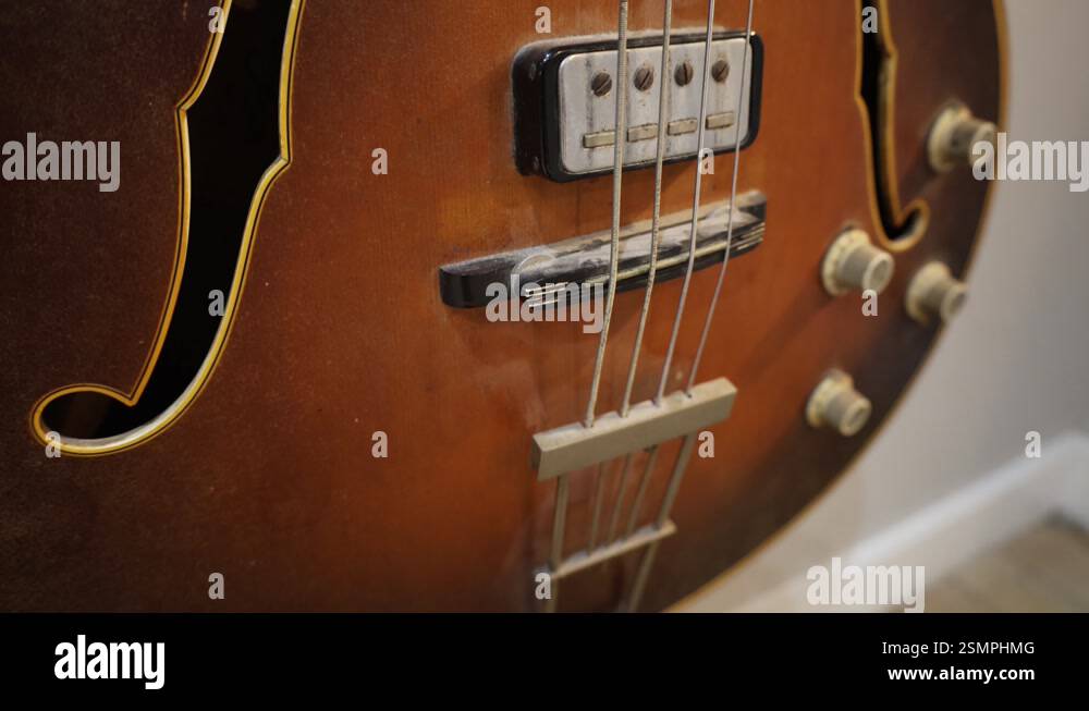Retro Electric Semi-Acoustic Bass Guitar, Movement From Top To Bottom ...