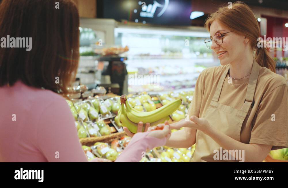 A delightful interaction occurs in a grocery store as a cheerful ...