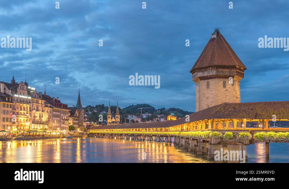 Lucerne (Luzern) Switzerland time lapse day to night skyline at Chapel ...