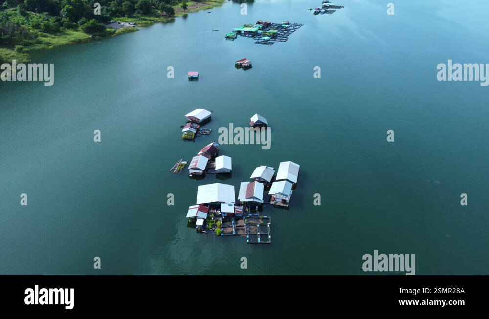 Many raft houses on the Vajiralongkorn Dam in Kanchanaburi, Thailand ...