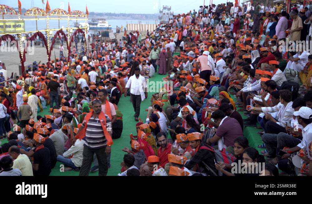 Varanasi, India - 08/15/2024: Large crowd of people sitting together at ...