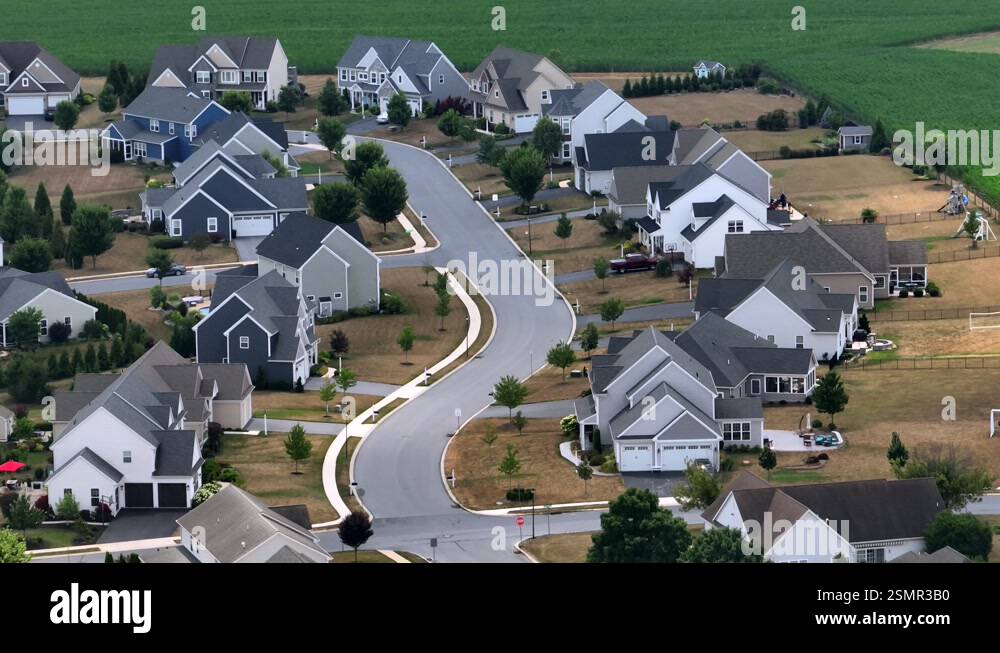 Modern new developed housing area with one family houses and dried out ...