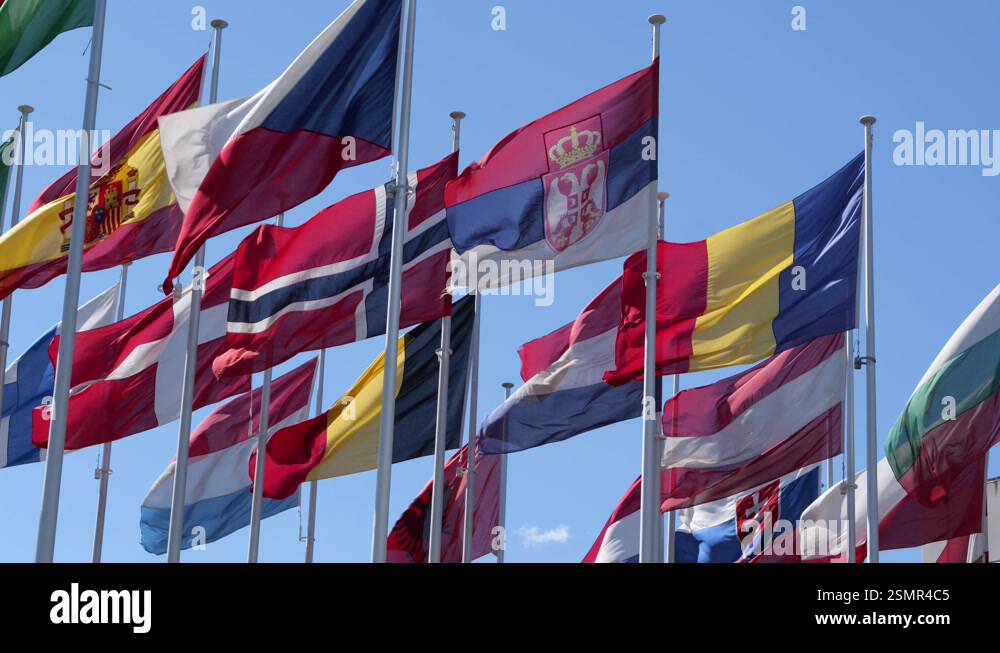 Flags with Pole of Various Nations Waving in Slow Motion Stock Video ...