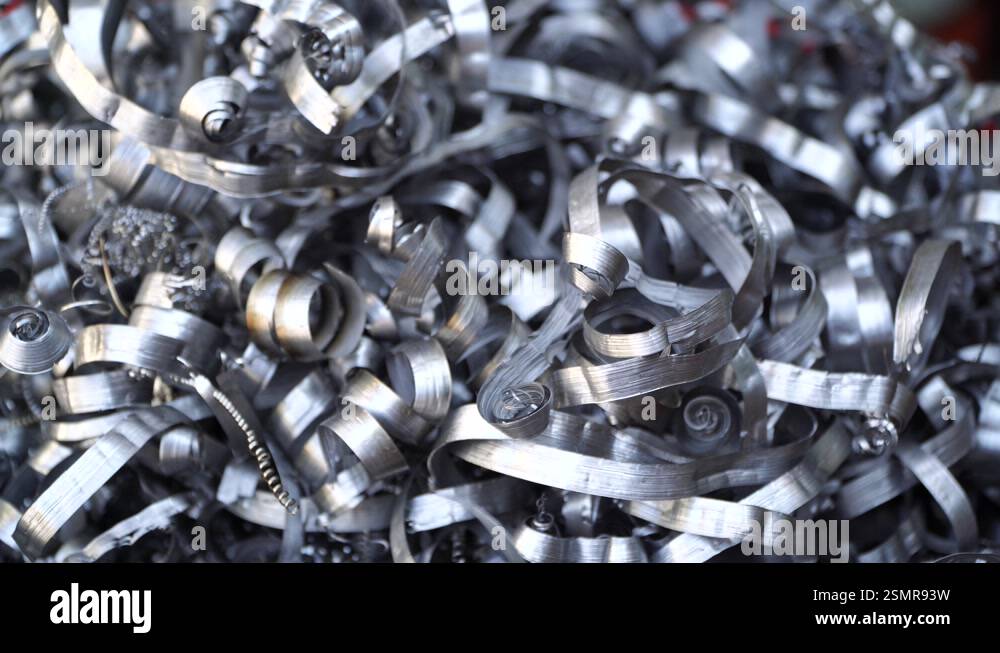 Steel scrap materials recycling. Aluminum chip waste after machining ...