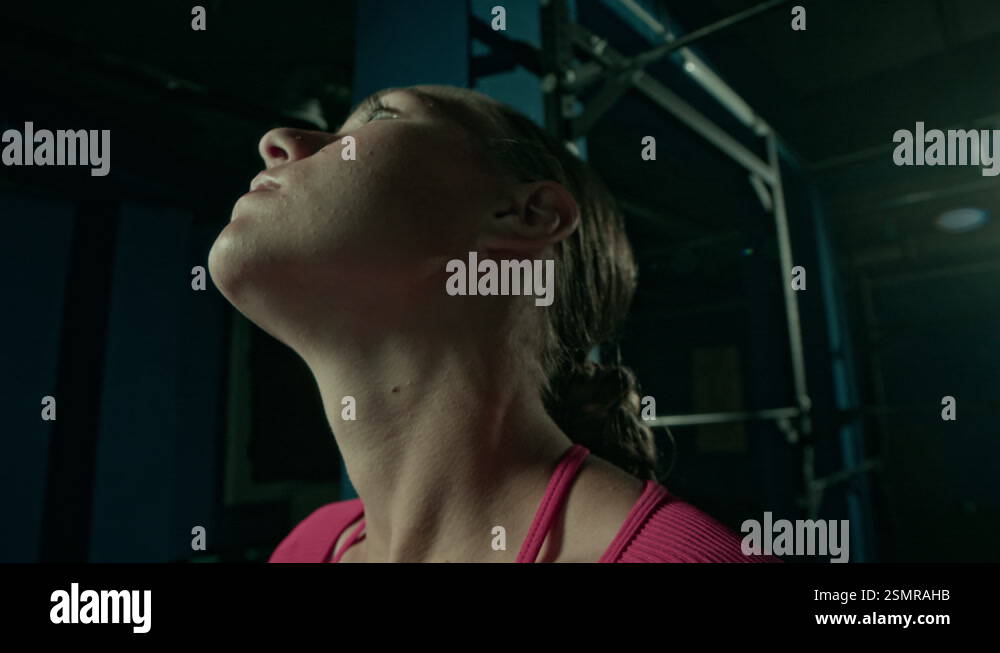 Young Sporty Woman Doing Head Rotations during Warmup before Gym ...