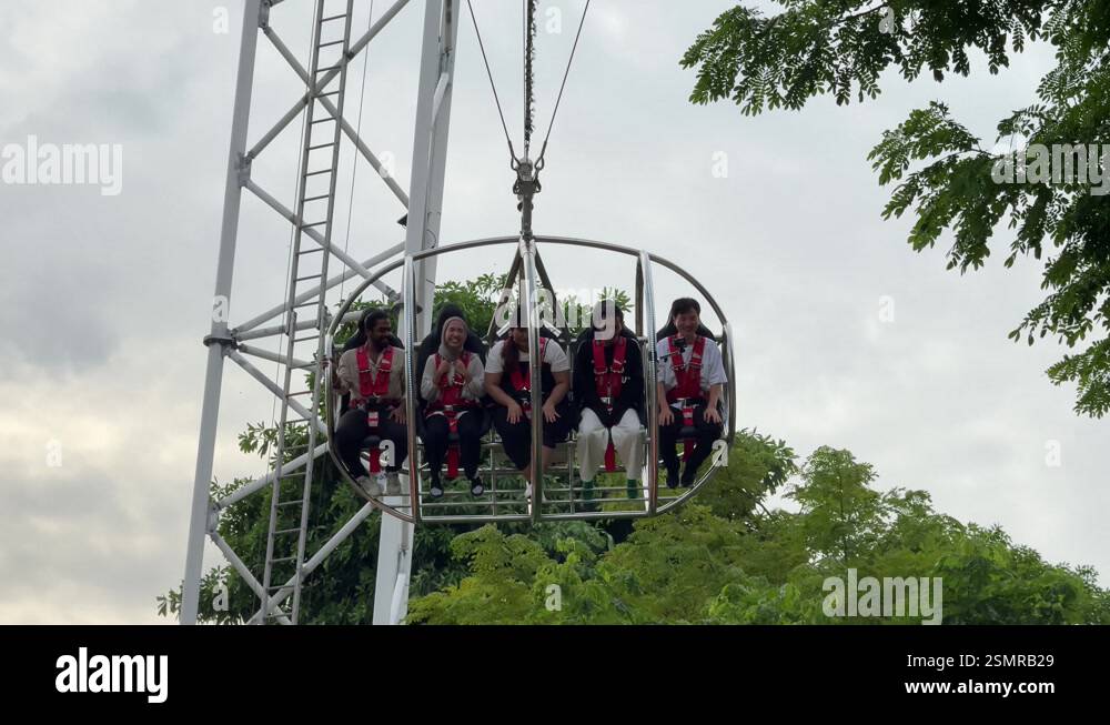 Singapore, Singapore - 08/15/2024: GX-5 Extreme Swing-Slingshot seated Stock Video Footage - Alamy