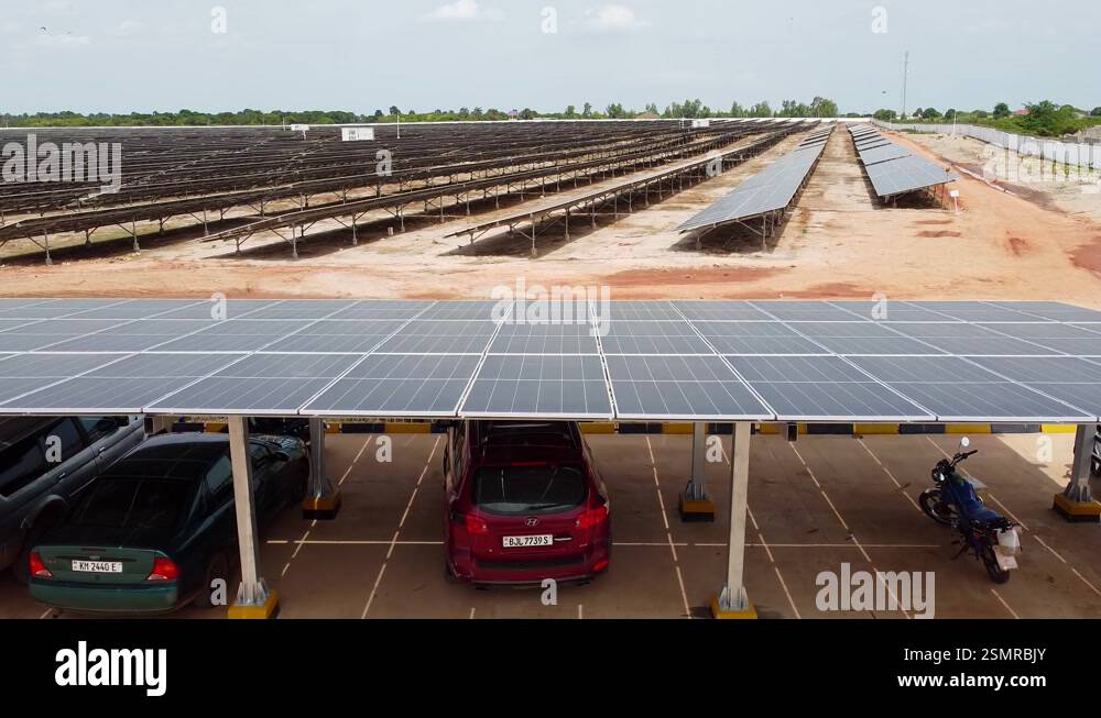 Jambur, Gambia - 08/18/2024: Aerial overview of solar car park shed and ...