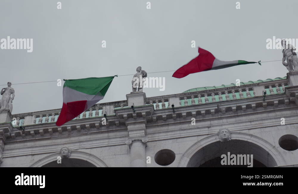 Italian flags fluttering on the rooftop of Basilica Palladiana, Vicenza ...