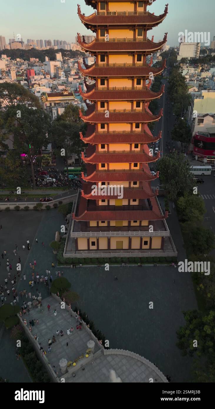 Ho Chi Minh City, Vietnam - 08/21/2024: Aerial vertical tilt down from ...