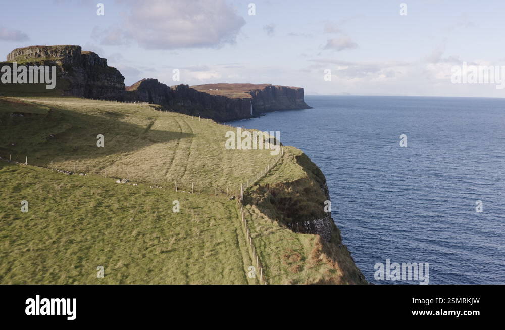 Sheep farm alongside cliff edge in Isle of Skye by the stunning sea ...