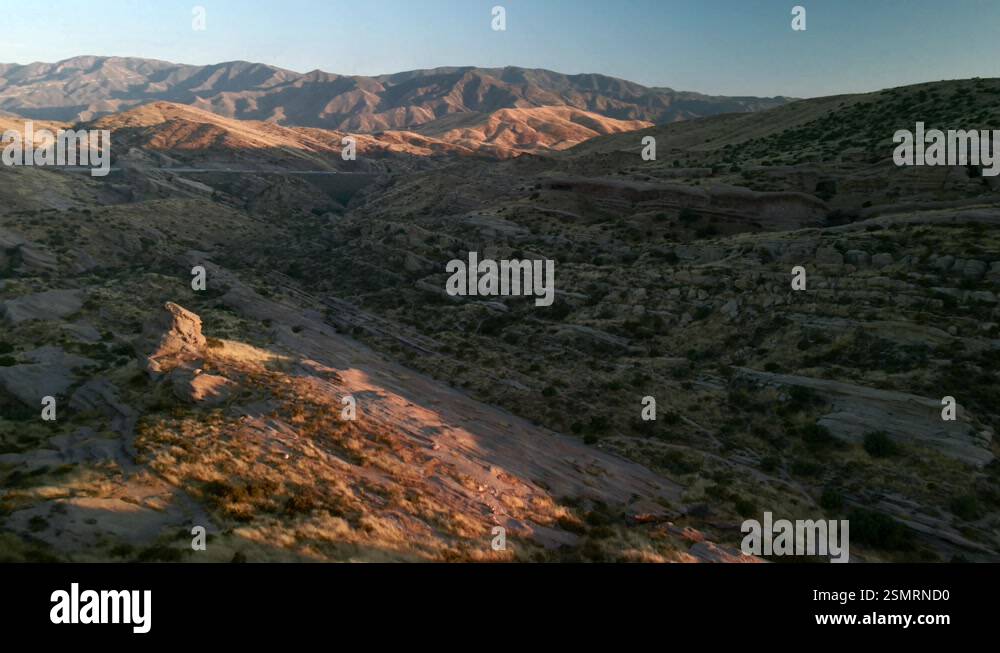 Aerial view tilting over a desert landscape of the Vasquez natural park ...