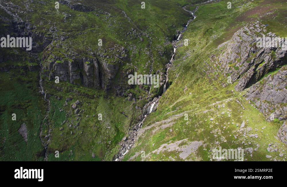 Ireland Epic Locations drone circling the Mahon Falls with steep cliffs ...