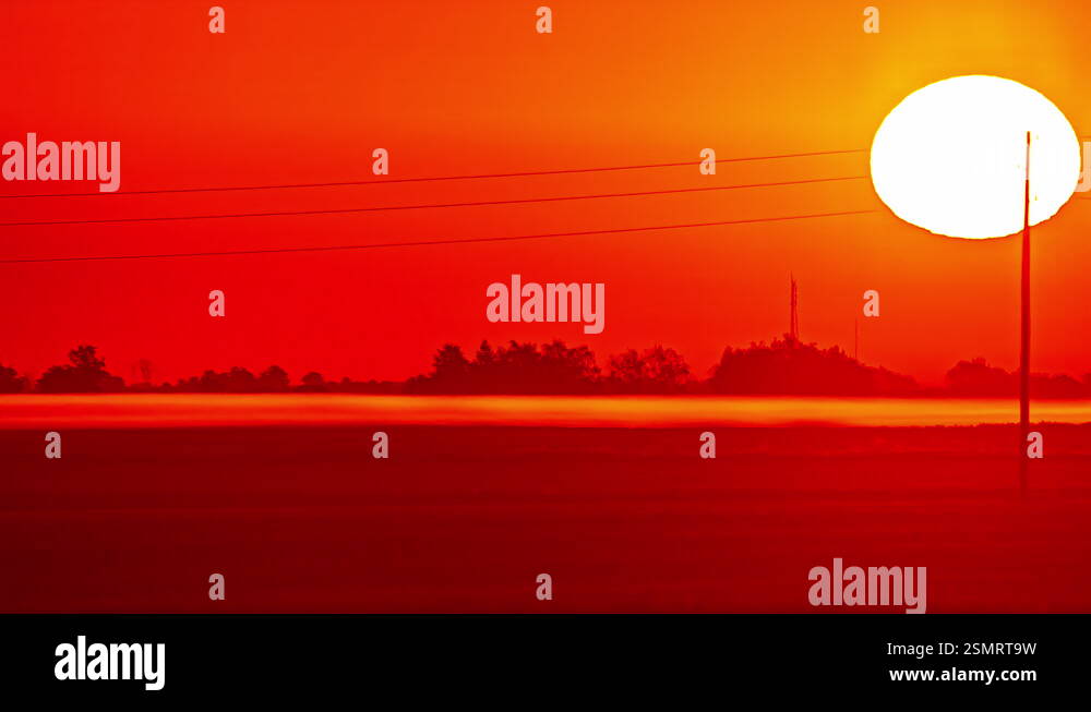Fiery red sunrise captured in a breathtaking time-lapse, with the sun ...