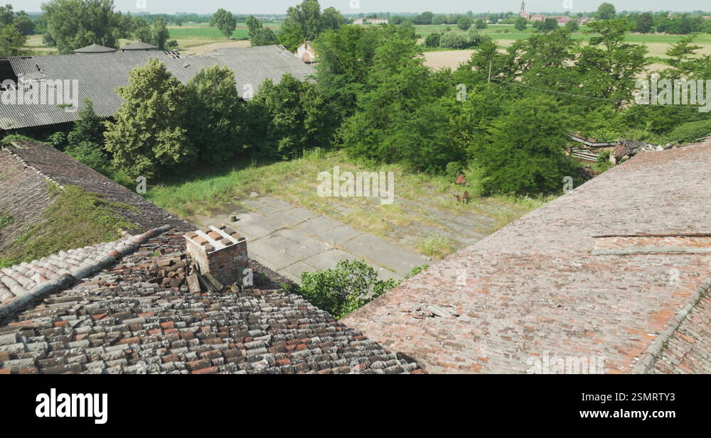 Little Cross On A Red Tiled Roof Of An Italian Structure. Aerial ...