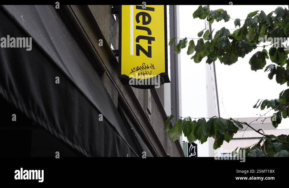 Hertz car rental company yellow signage video 4k Stock Video Footage ...