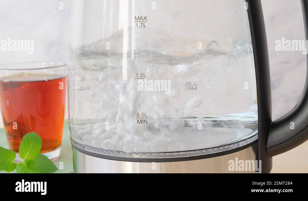 Close up view of boiling water boiling water in a transparent dish ...
