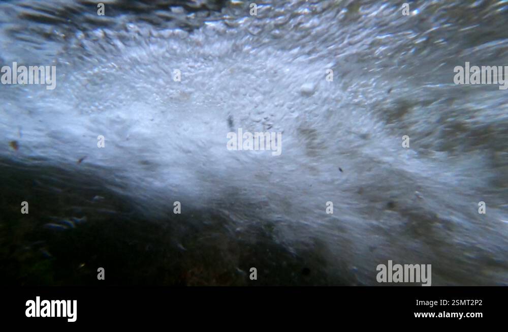 Underwater shooting of a mountain transparent river. camera in water ...