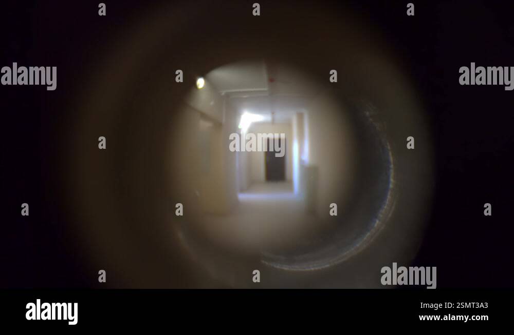 A Mysterious Hallway Viewed Through a Small Peephole Reveals Intriguing ...