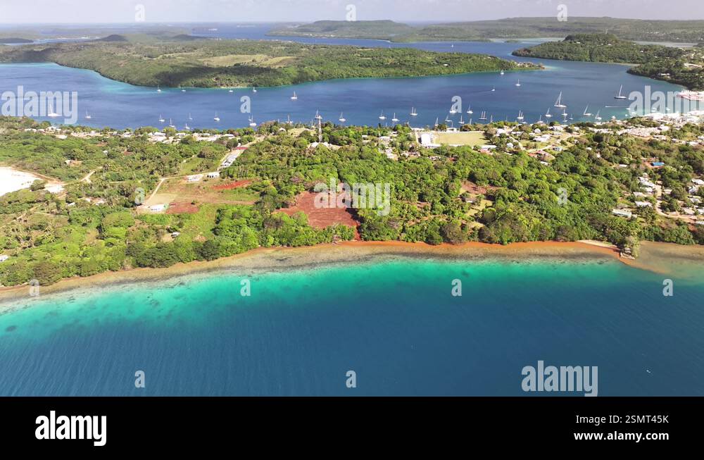 Turquiose water and coral reef Vava'u Island coastal with Neiafu city ...