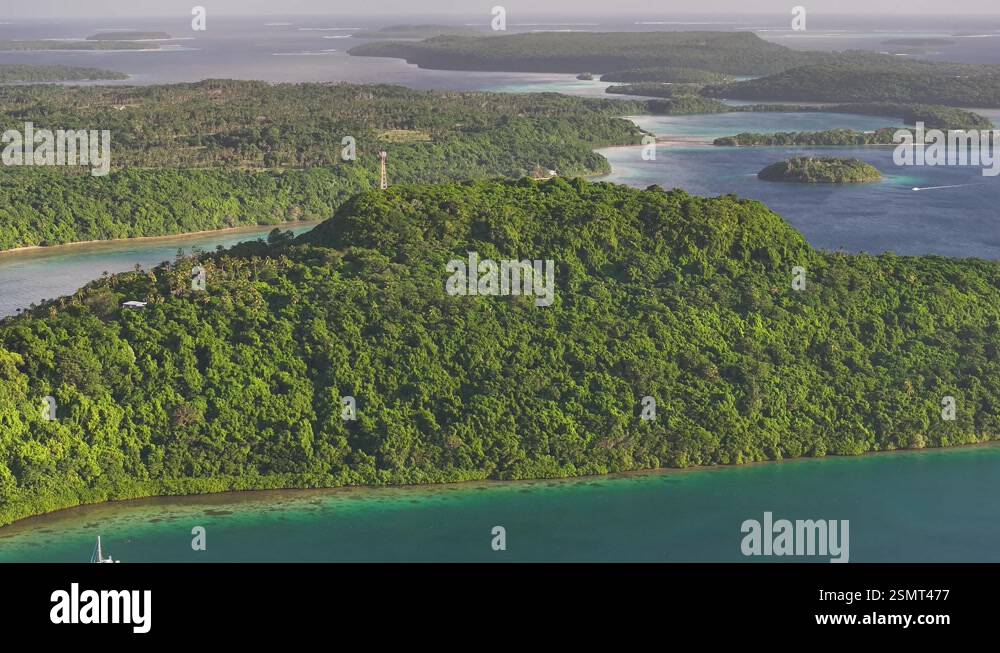 Mt Talau and telecommunication tower, lush green tropical island Stock ...