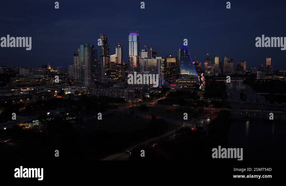 Downtown Austin, Texas at night with gorgeous sunset reflections on ...