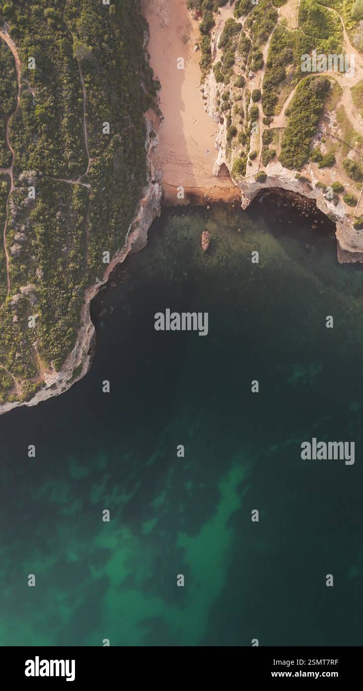 Aerial view of Praia das Fontainhas with cliffs, Portugal Stock Video ...