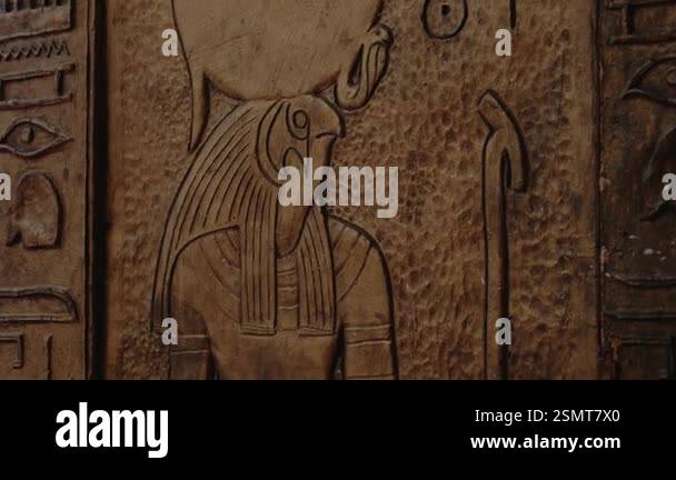 Ancient Egyptian carving of Horus, the falcon-headed god, with ...