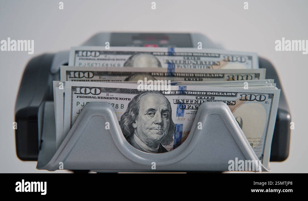 Bank automated equipment counting money closeup. Exchange currency in ...